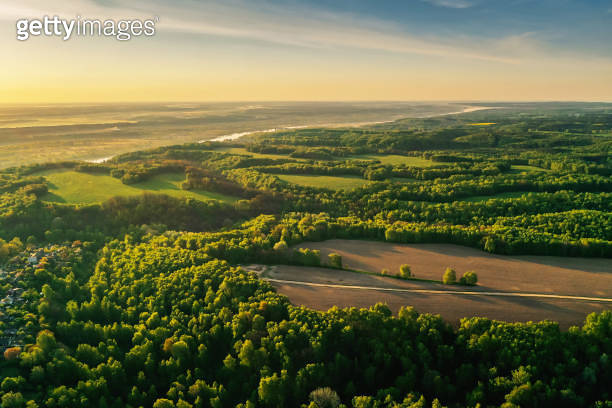 Beautiful sunrise. Aerial view of meadow from above. Spring nature ...