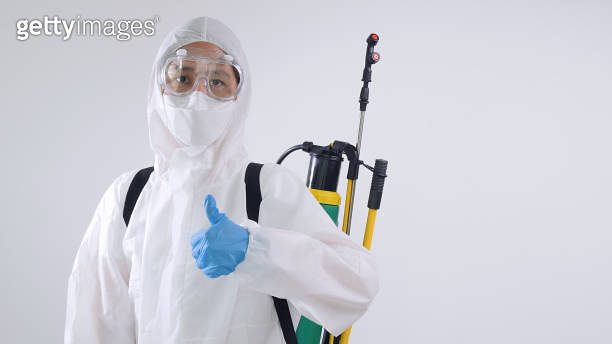 Asian virology scientists wearing PPE suit and using chemical equipment ...