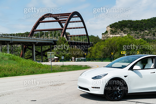 Tesla Model Y All Electric Crossover at Pennybacker Bridge in Austin ...