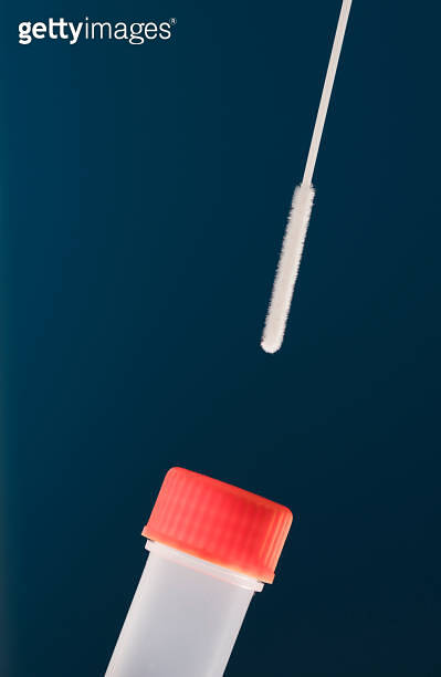 Rapid test set, vial with orange cap and swab, sticker for patient data ...