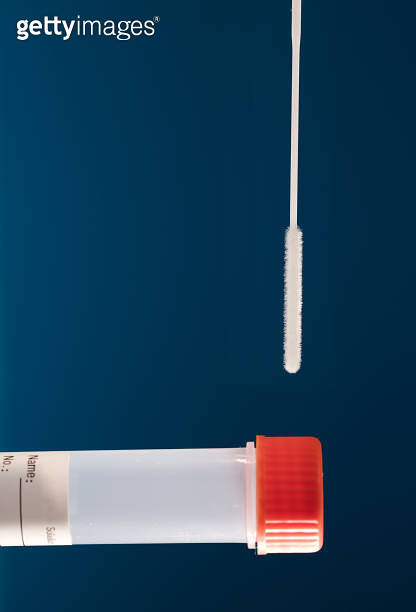 Rapid test set, vial with orange cap and swab, sticker for patient data ...