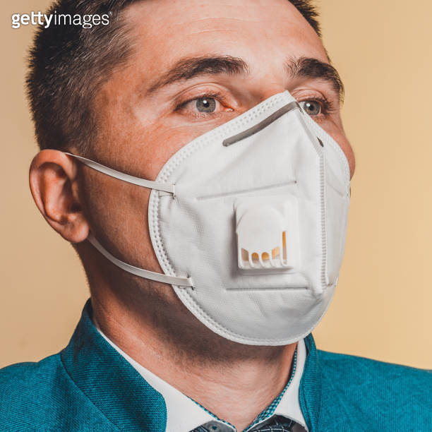 Closeup of face male patient in face shield on self isolation during ...