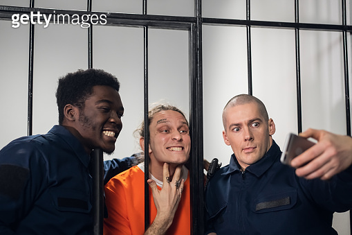 Actors on the set of a movie about prison make a funny selfie in a ...