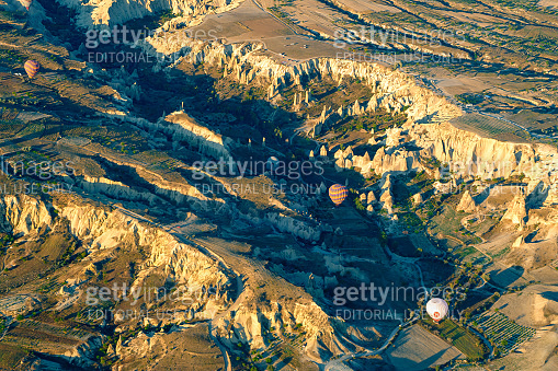 Aerial view of air balloon over fields, Cappadocia, Turkey. Aerial ...