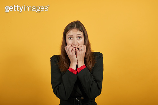 Scared Woman Touches Hands To Face With A Confused Look. Fear, Shock Of ...