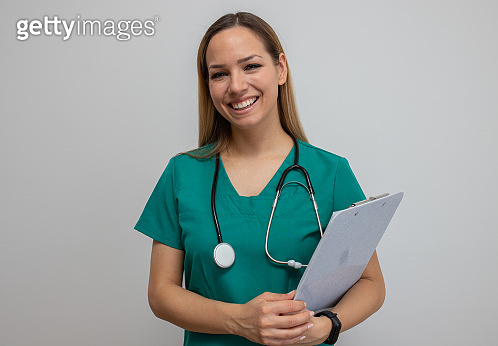 Confident nurse standing arms crossed. Confident young woman doctor ...