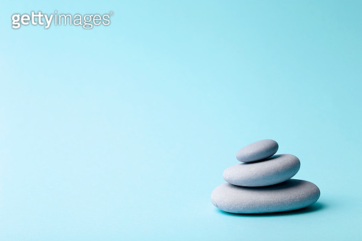 Zen background blue color with Japanese stones (stone towers) for spa ...