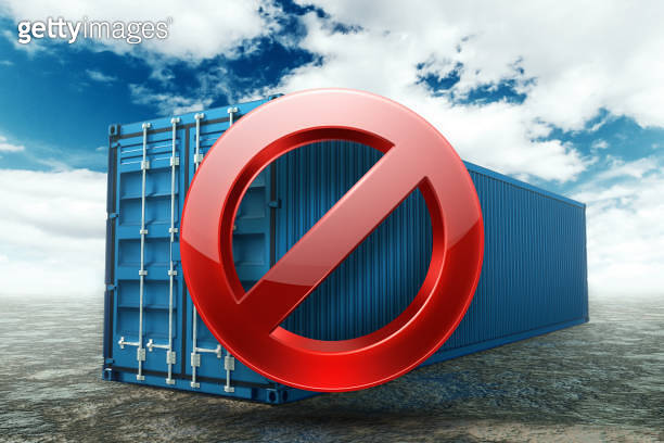 Sea containers are closed by a stop sign, a ban, industrial port with ...