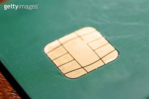 Micro credit card chip close-up, soft focus. New technologies, EMV chip ...