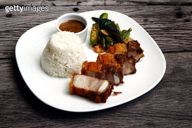 Filipino food called Lechon Kawali or crispy deep fried pork with rice ...