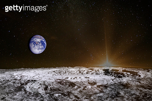 Sunrise above the moon surface. Blue Earth in the space. Moon is ...