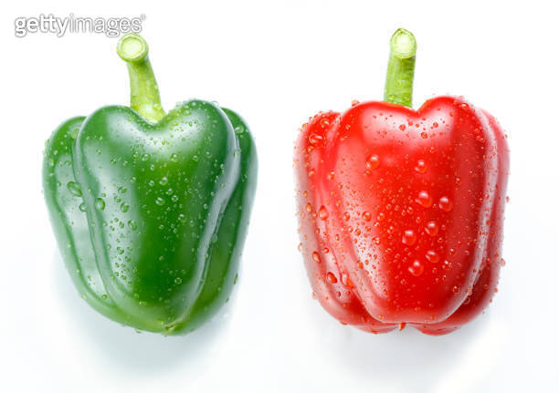 red pepper in group with green pepper with water drops retouched and ...