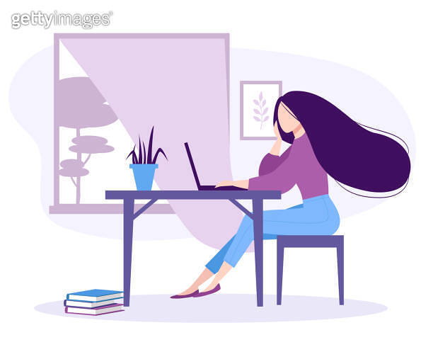 Home office, coworking space. Young pretty girl working on laptop in ...