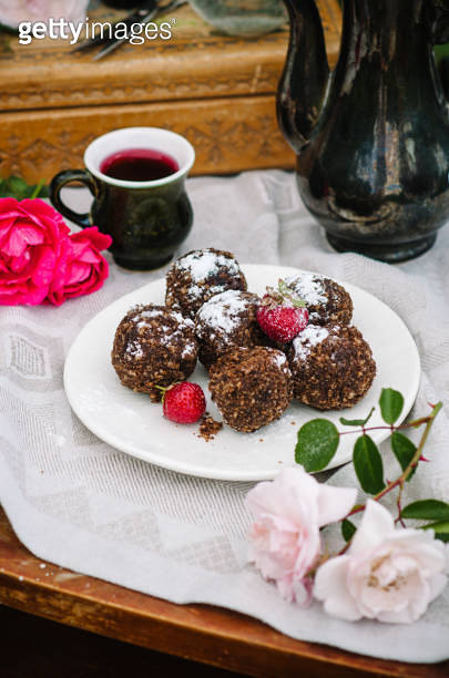 Tea party in nature with homemade sweets. Chocolate truffle. Homemade ...