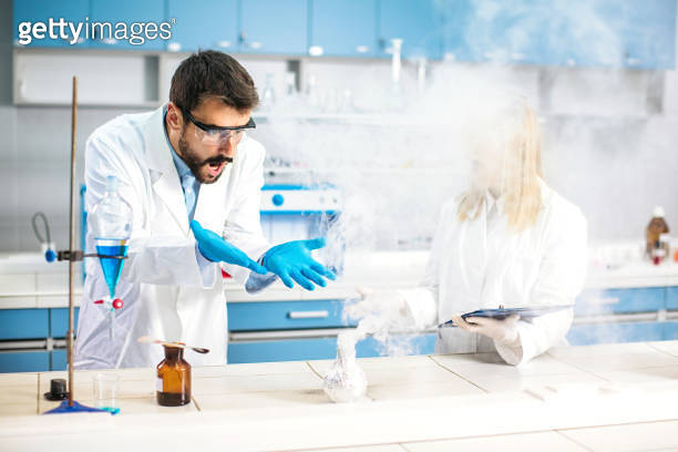 Young Scientists at the laboratory dealing with problem (1270263213 ...