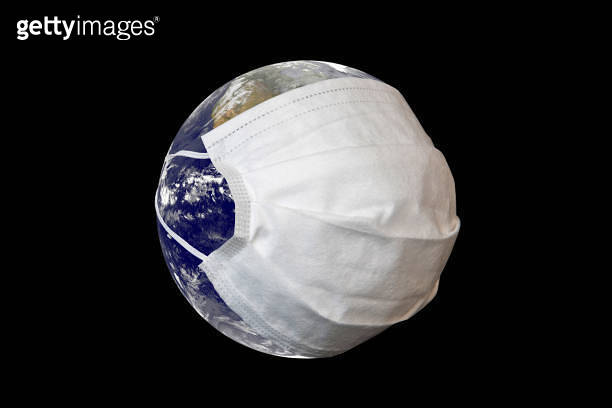 Planet Earth with face mask protect on dark. Elements of this image ...