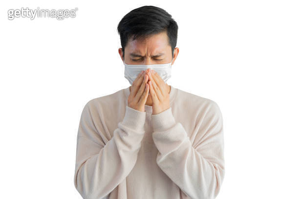 close up asian man coughing inside face mask after breathing isolated ...