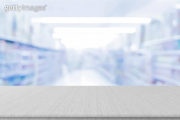 abstract blurred drug store aisle shelf distribution background with ...