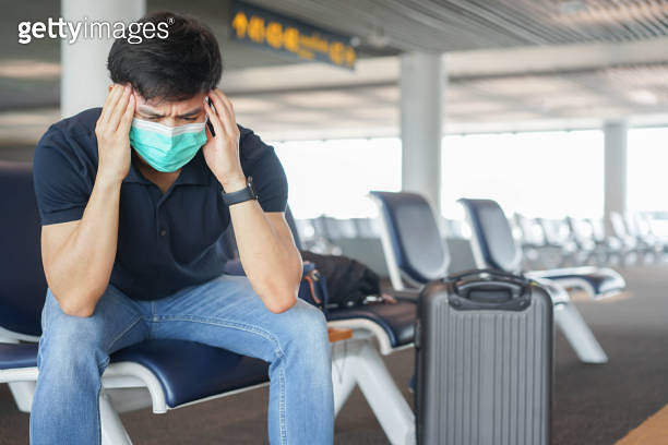 close up adult asian man sitting alone at lounge feeling headache while ...