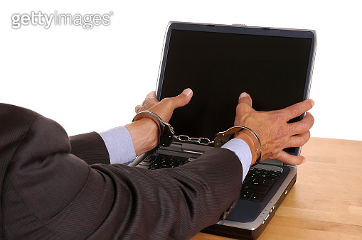 Hands Cuffed grabbing computer screen 이미지 (1283595329) - 게티이미지뱅크