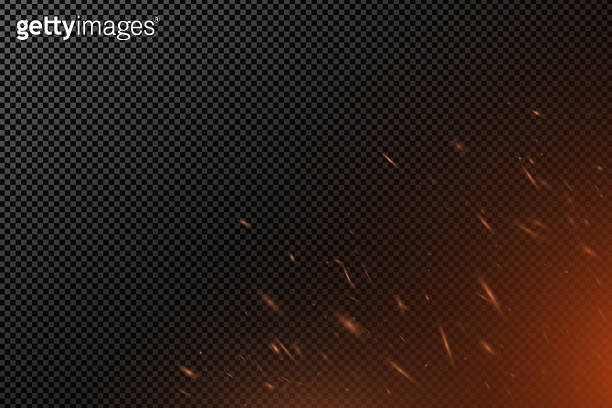 Realistic fire effect with particles on a transparent dark background ...