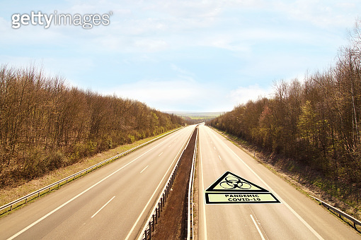 empty road, Highway, with warning sign, biohazard symbol, Pandemic ...