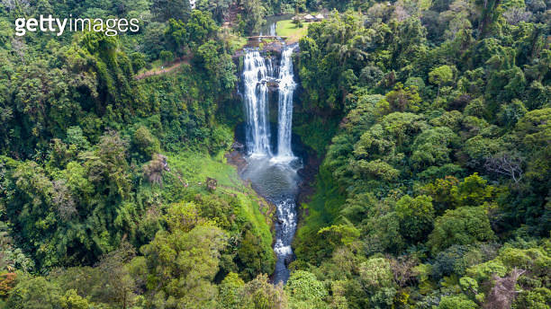 Aerial view of Tad Yaung waterfall in rainforest at Pakse and Champasak ...
