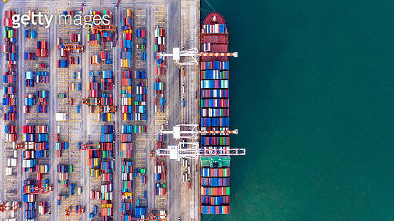 Container ship unloading in deep sea port, Global business logistic ...