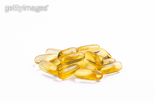 Bunch of healthy nutritious food supplements in a form of gel pills ...