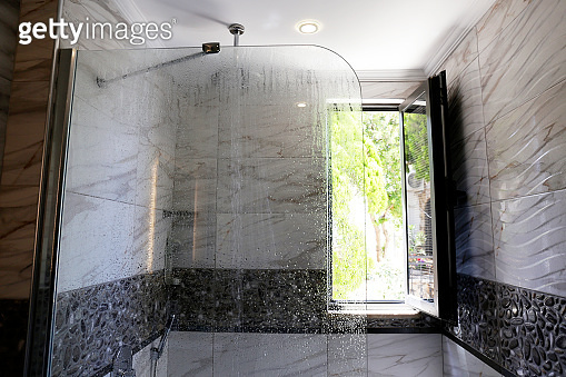 Interior of a modern bathroom with glass shower booth. 이미지 (1256736075 ...
