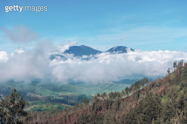 Photograph of high volcano with clouds on Java island (1221841037) - 게티 ...