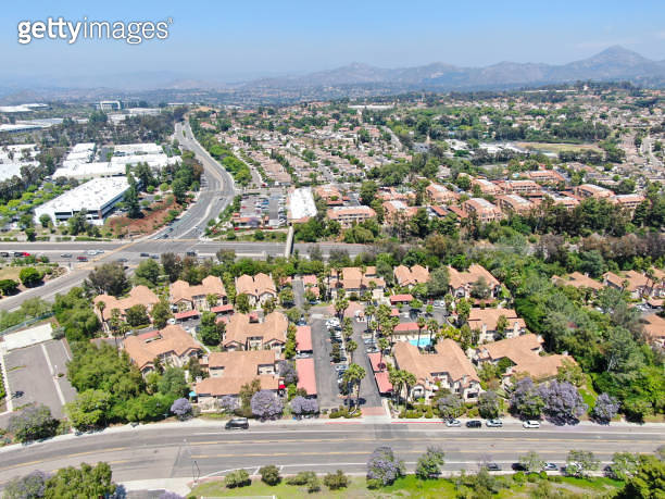 Aerial view middle class neighborhood with condo community and ...