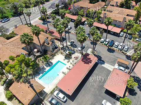 Aerial view middle class neighborhood condo community swimming pool ...