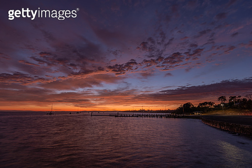 water and sunrise view Corinella boat ramp (1221941362) - 게티이미지뱅크