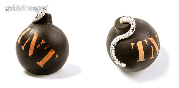 two TNT toy black round bombs with a wick (1266392528) - 게티이미지뱅크