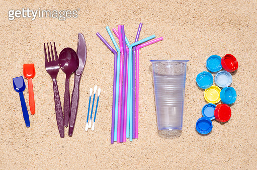 Disposable single-use plastic objects such as bottles, cups, forks ...