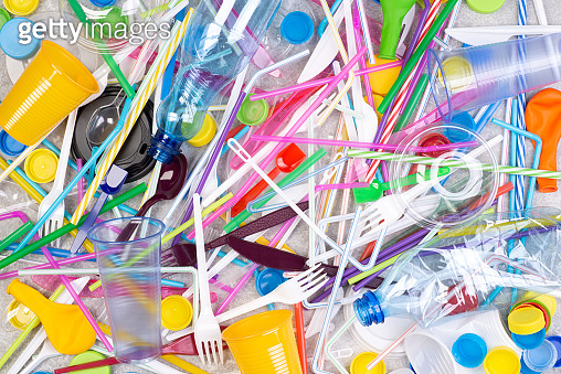 Disposable single-use plastic objects such as bottles, cups, forks ...