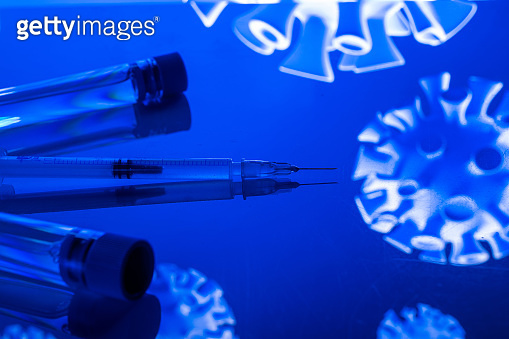 Disease outbreak. Medical syringe with needle for protection flu virus ...