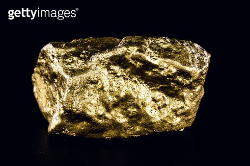 Nugget of gold, stone of value, golden texture. Crude gold mined ...