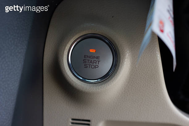 Close up engine car start button. Start stop engine modern new car ...
