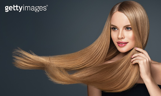 Mature blonde haired beautiful model with long,straight, well groomed ...