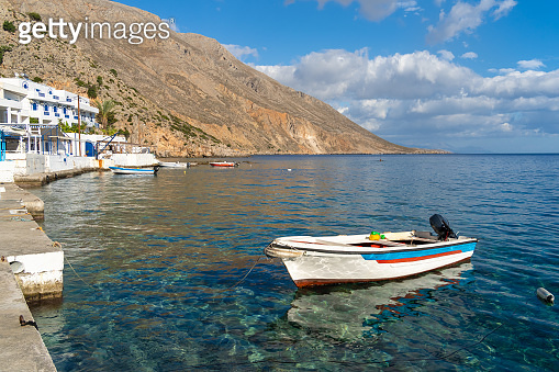 The isolated idyllic port village of Loutro, only accessible by foot or ...