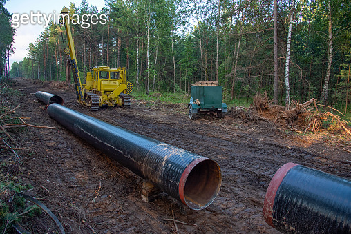 Pipelayer with side boom Installation of gas and crude oil pipes in ...