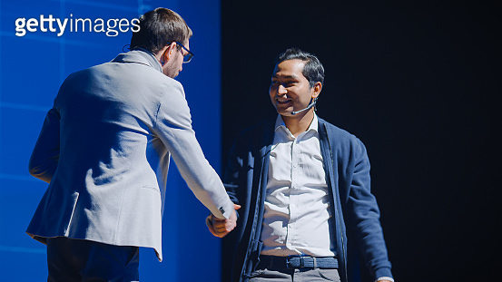 On Stage: Startup CEO Greets Tech Guru During Presentation of a New ...