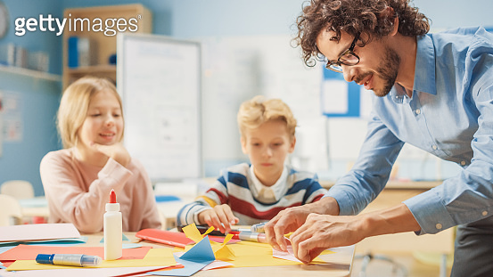School Arts & Crafts Class: Enthusiastic Teacher and Diverse Group of ...