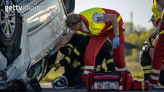 Paramedics and Firefighters Arrive On the Car Crash Traffic Accident ...