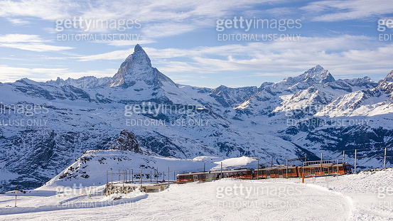 The Gornergrat Railway with a stunning view of the Matterhorn Mountain ...