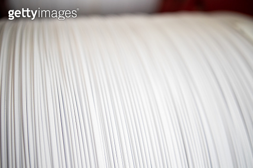 Vertical coils industrial wires. Many turns of main electrical cable is ...