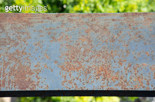 Top view and close shot of rusted metal beam installed at high level ...