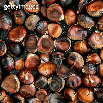 Roasted chestnuts as Background. Chestnuts for Christmas close-up."n ...